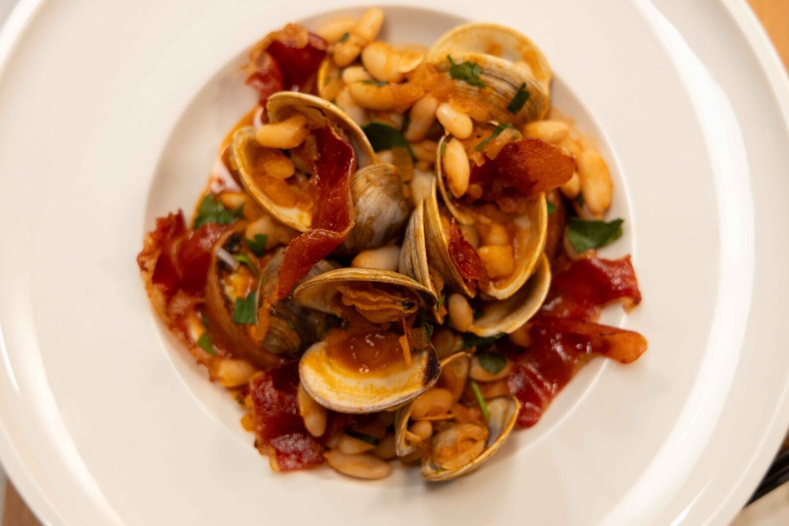 Clams with Crispy Ham and Butter Beans - Gusto TV